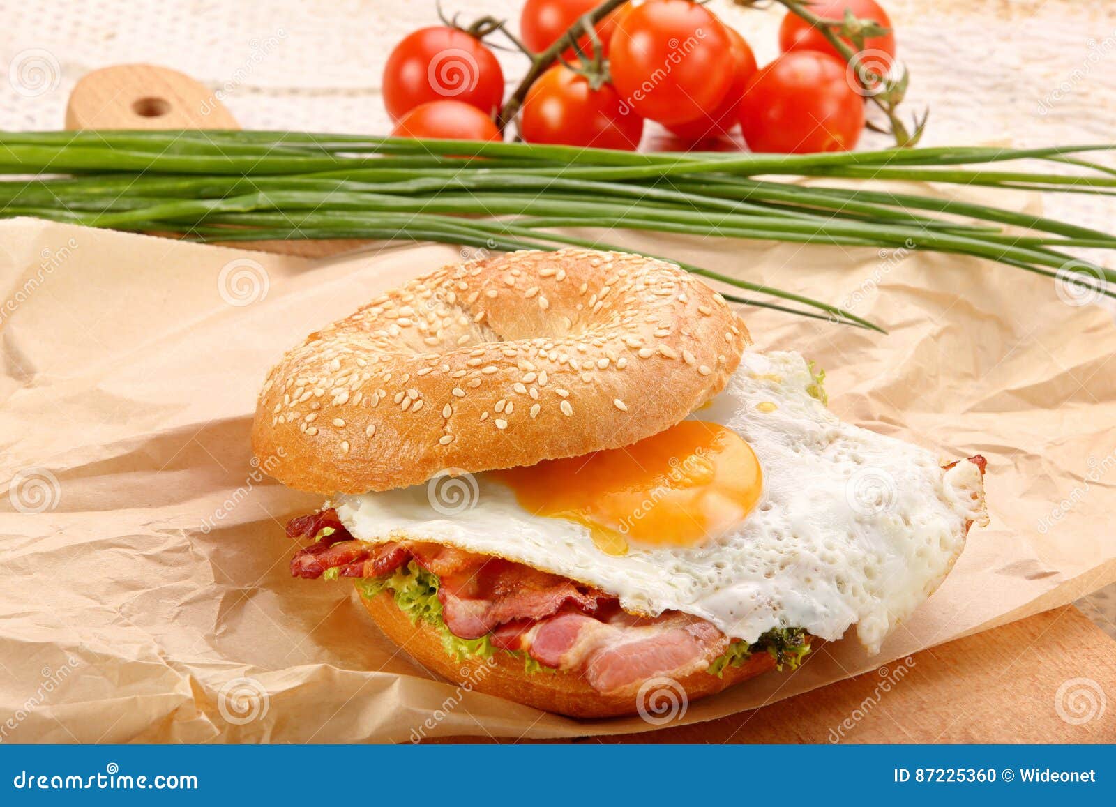 Sesame Bagel with Bacon and Fried Egg Stock Photo - Image of food ...