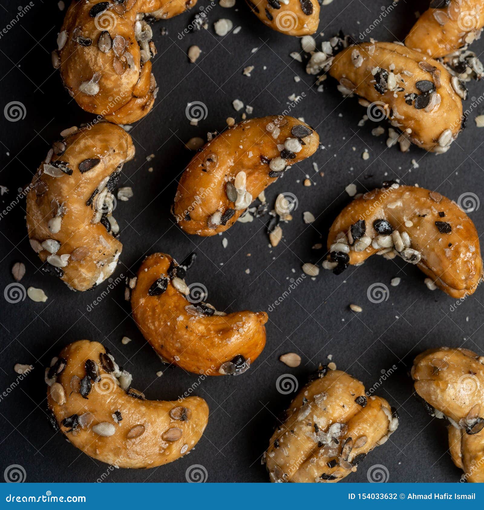 Sesame Coated Cashew Nuts. stock photo. Image of cashew - 154033632