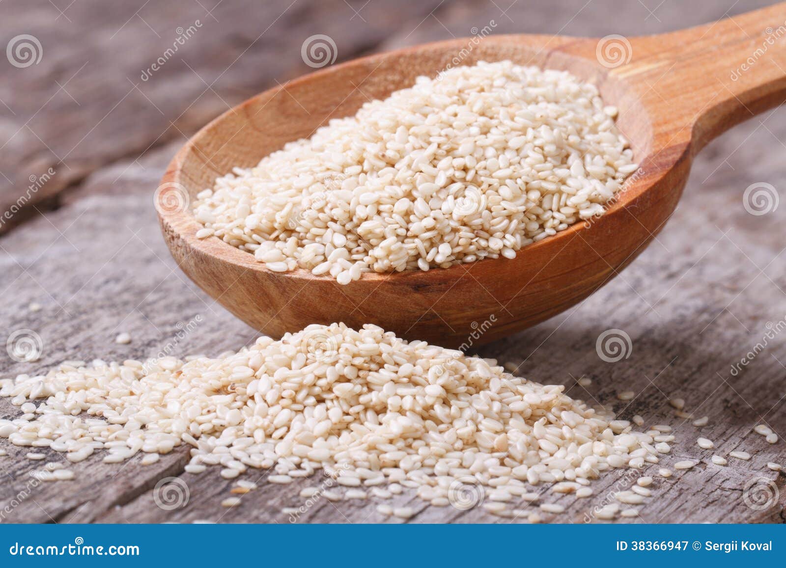 Sesame Seeds in a Wooden Spoon Closeup Stock Image - Image of close ...