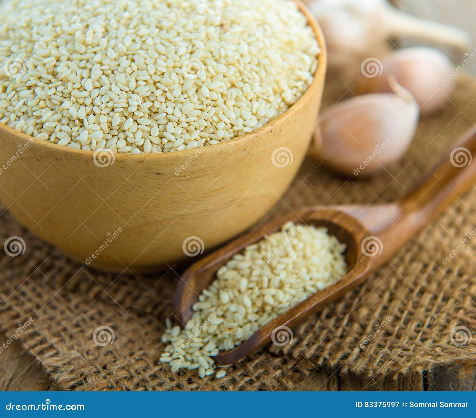 Sesame in wood bowl stock image. Image of closeup, cooking - 83375997