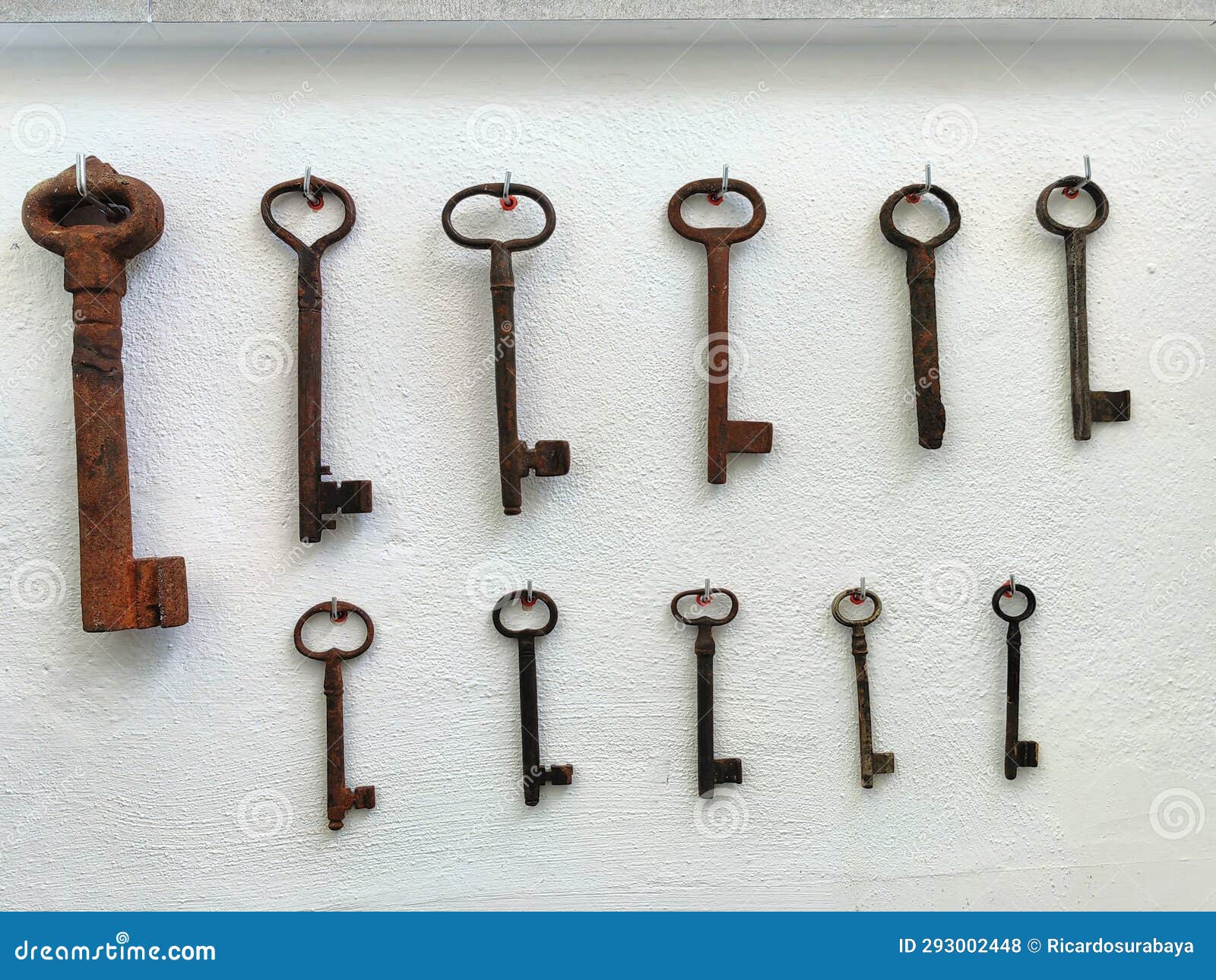 Set of Ancient Keys Holding from the Wall Stock Photo - Image of metal ...