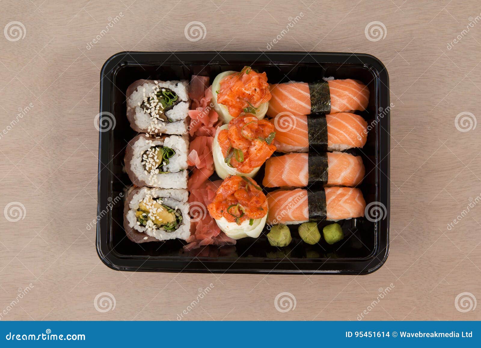 Set of Assorted Sushi Kept in a Black Box Stock Photo - Image of ...
