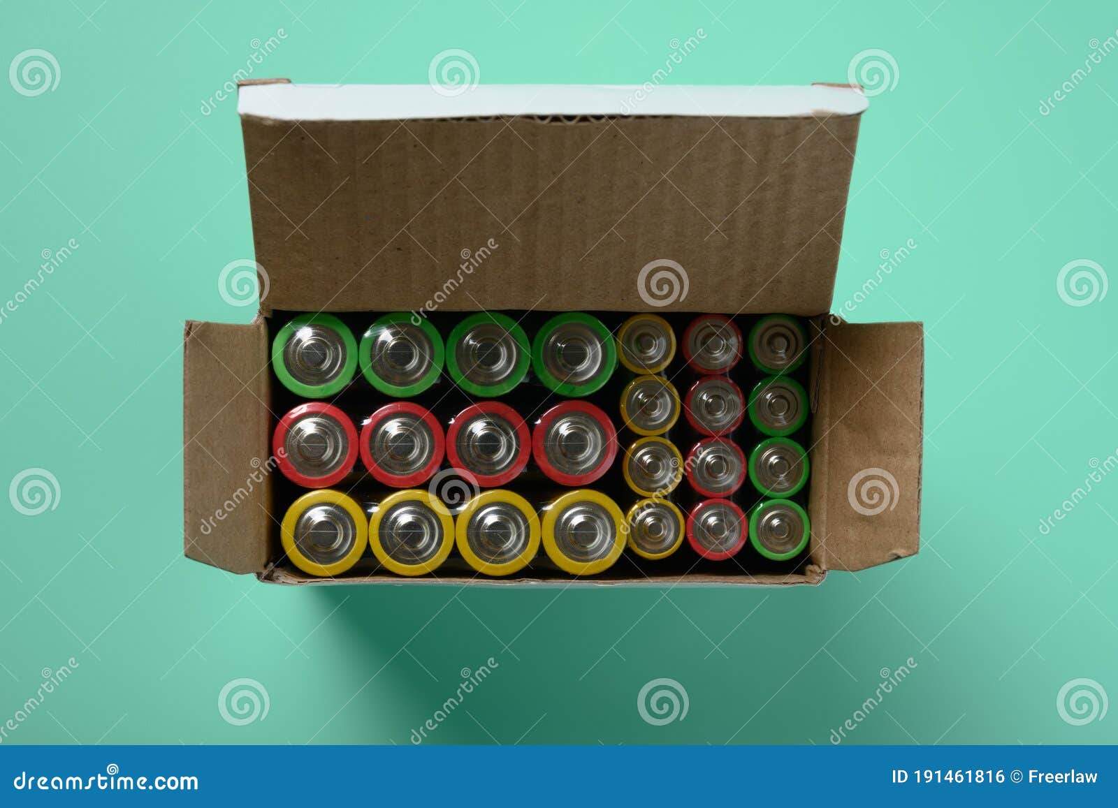A Set of Batteries on Green Background Stock Photo - Image of people ...