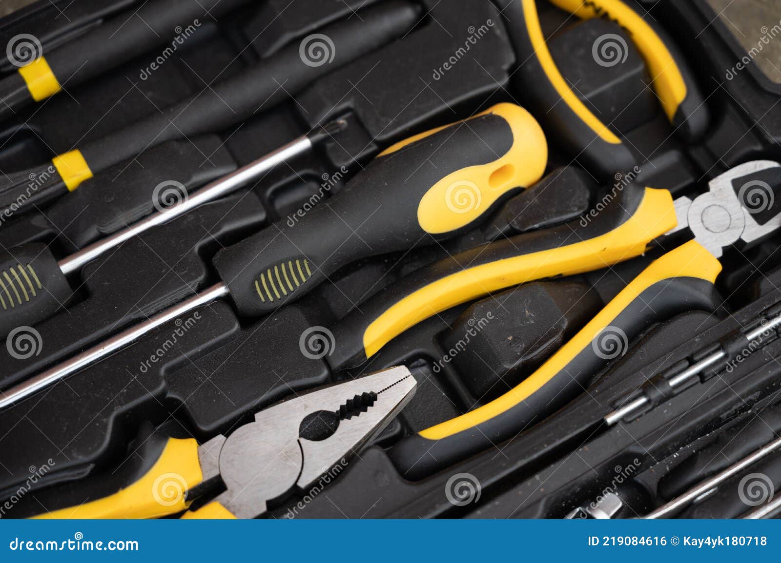 A Set of Black and Yellow Tools Stock Photo - Image of hand, yellow ...