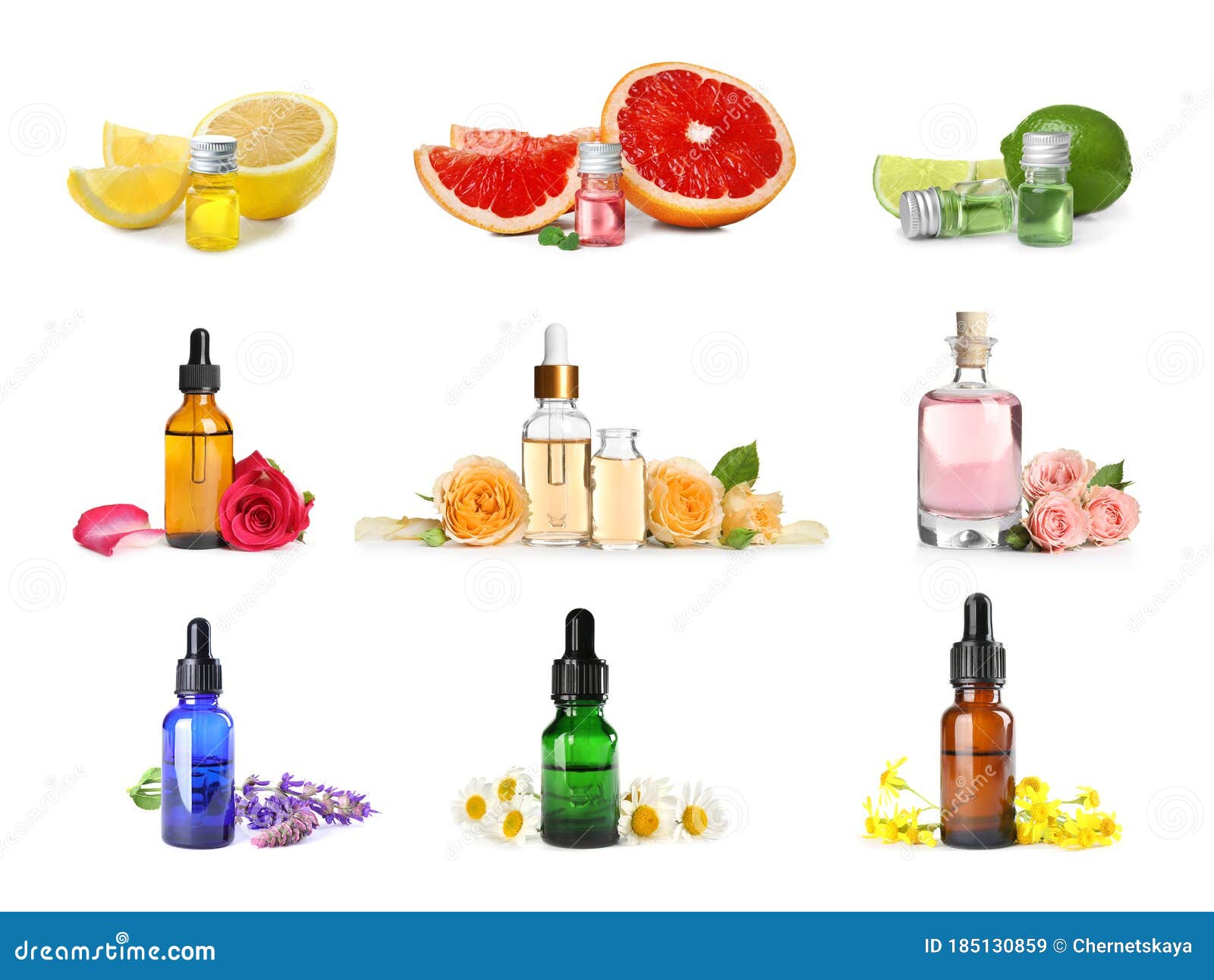 Set with Bottles of Different Essential Oils, Citruses and Flowers on ...