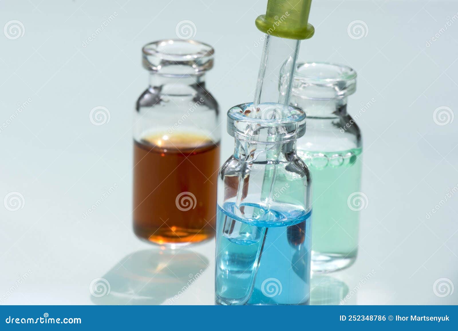 Set of Bottles with Reagents and Pipette on Lab Table Stock Photo ...