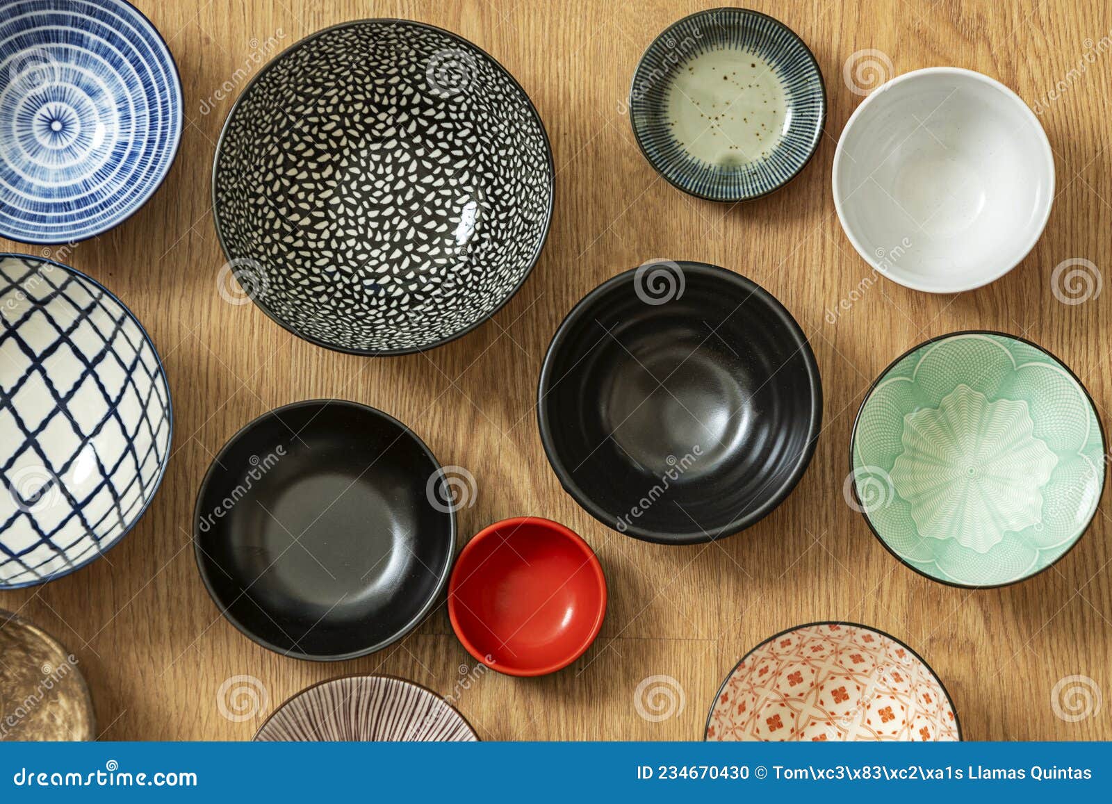 Set of Bowls of Different Colors Seen Stock Photo - Image of wood ...
