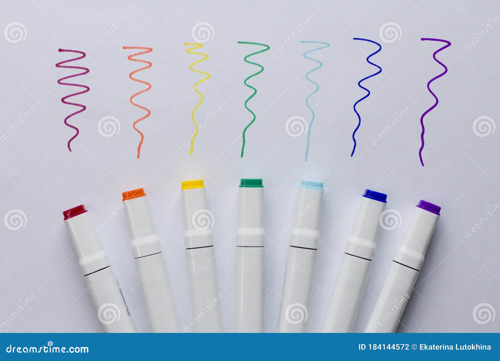 A Set of Bright Multi-colored Felt-tip Pens or Markers Lie on White ...