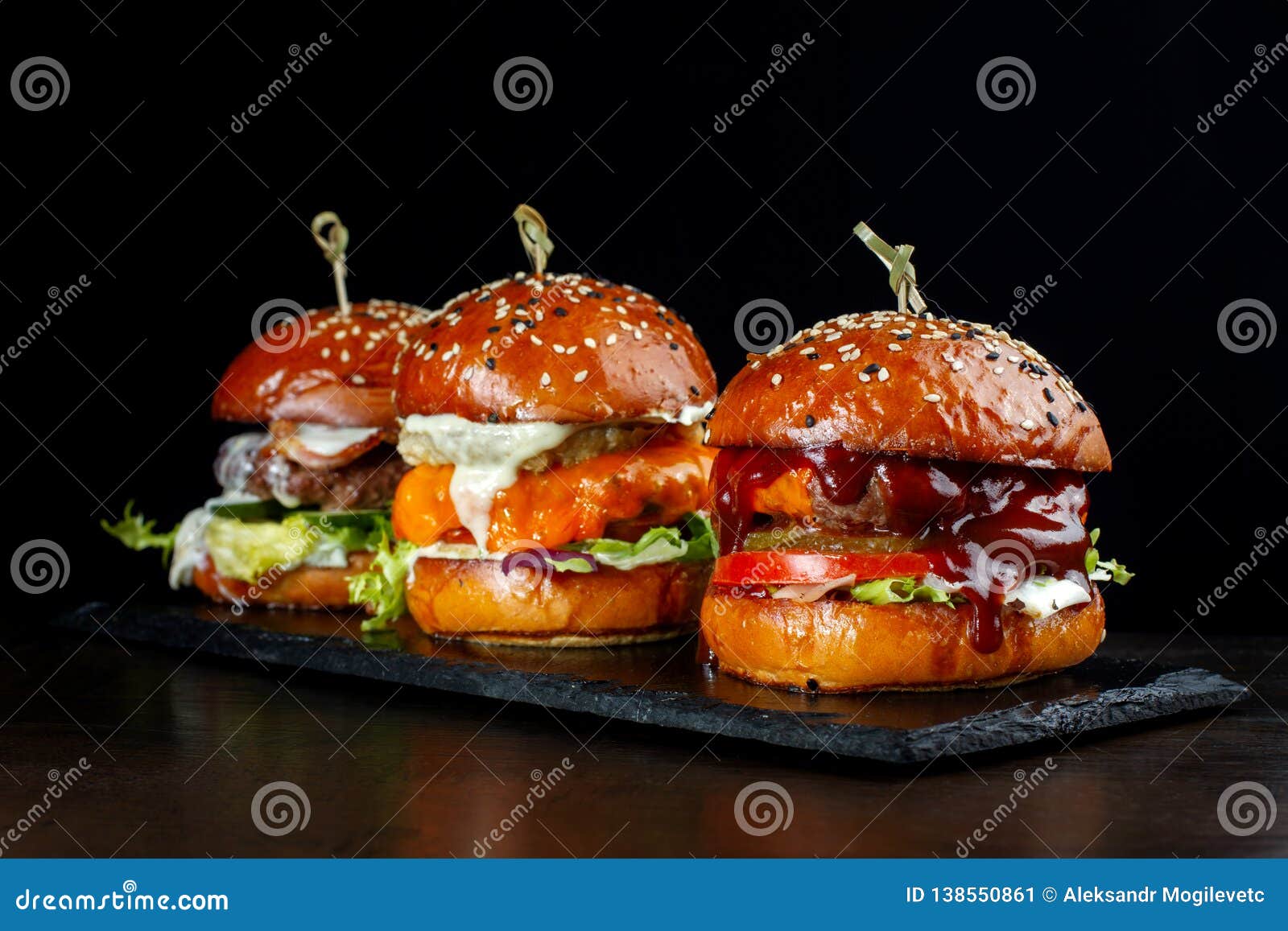 Set Burgers with Beef. on a Black Background. Stock Image - Image of ...