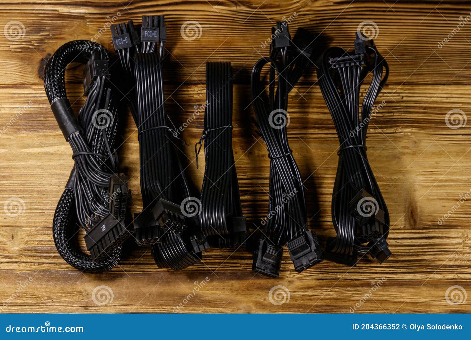 Set of Cables for Computer PSU on Wooden Desk Stock Photo - Image of ...