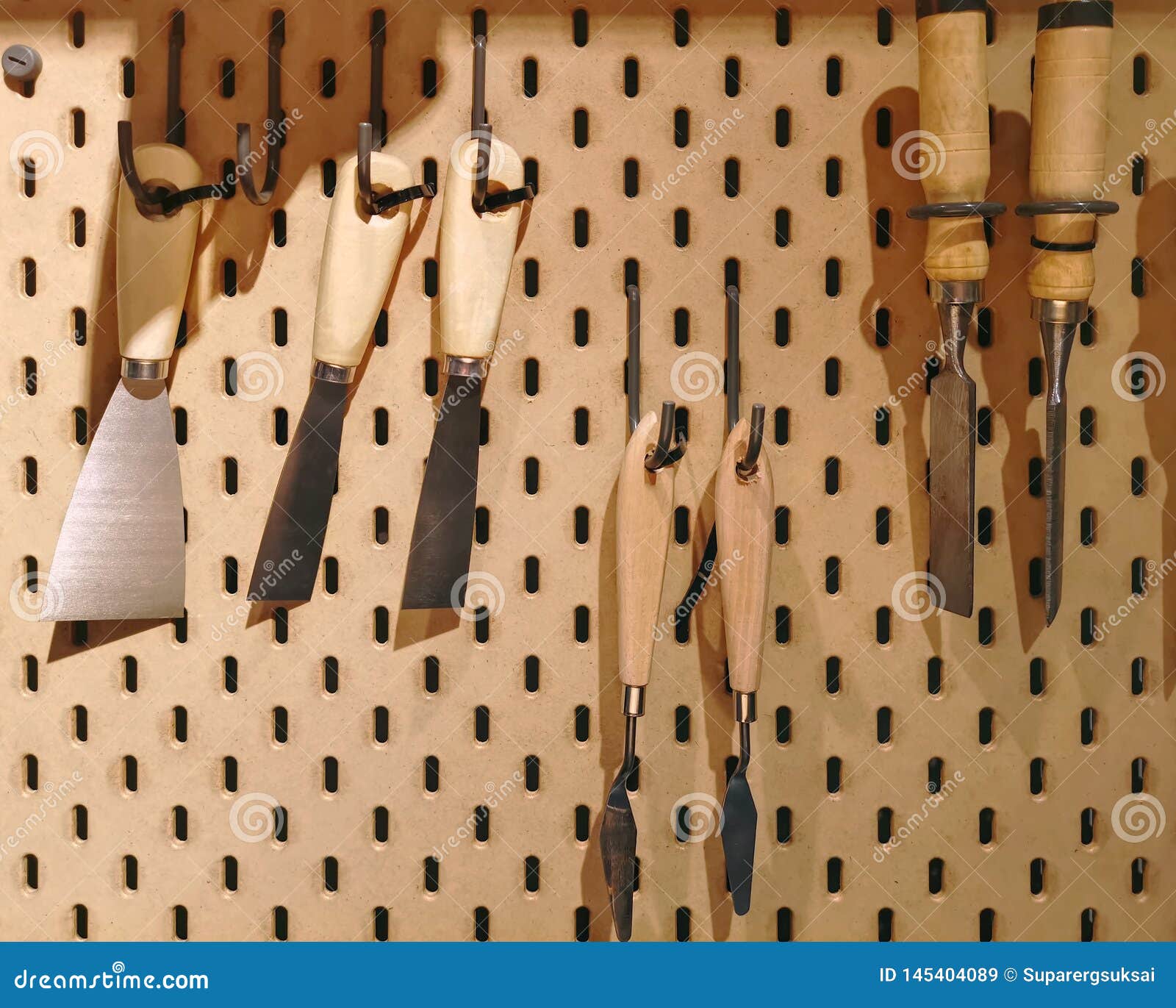 Set of Capentry Tools Hanging on Workshop Board Stock Image - Image of ...