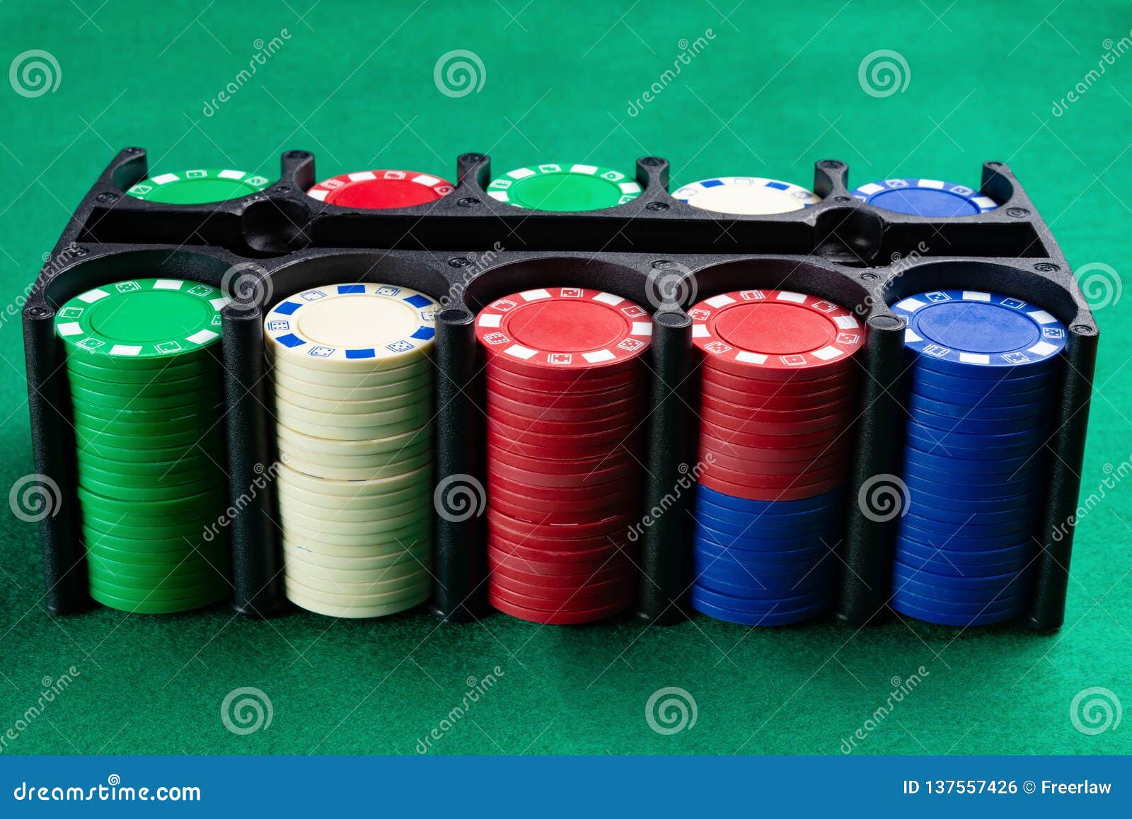 Cashino Chips on a Green Background Stock Photo - Image of pile, poker ...