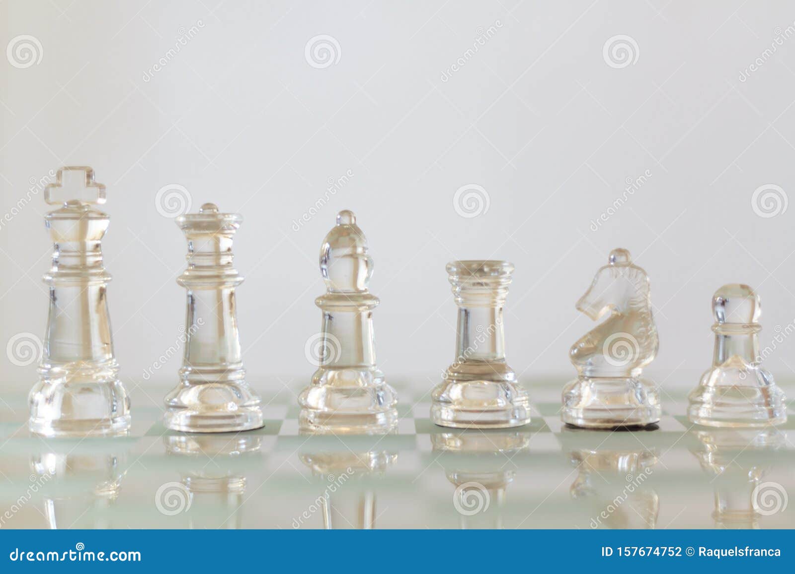 Set of Chess Pieces Standing in Line on Chessboard Stock Photo - Image ...