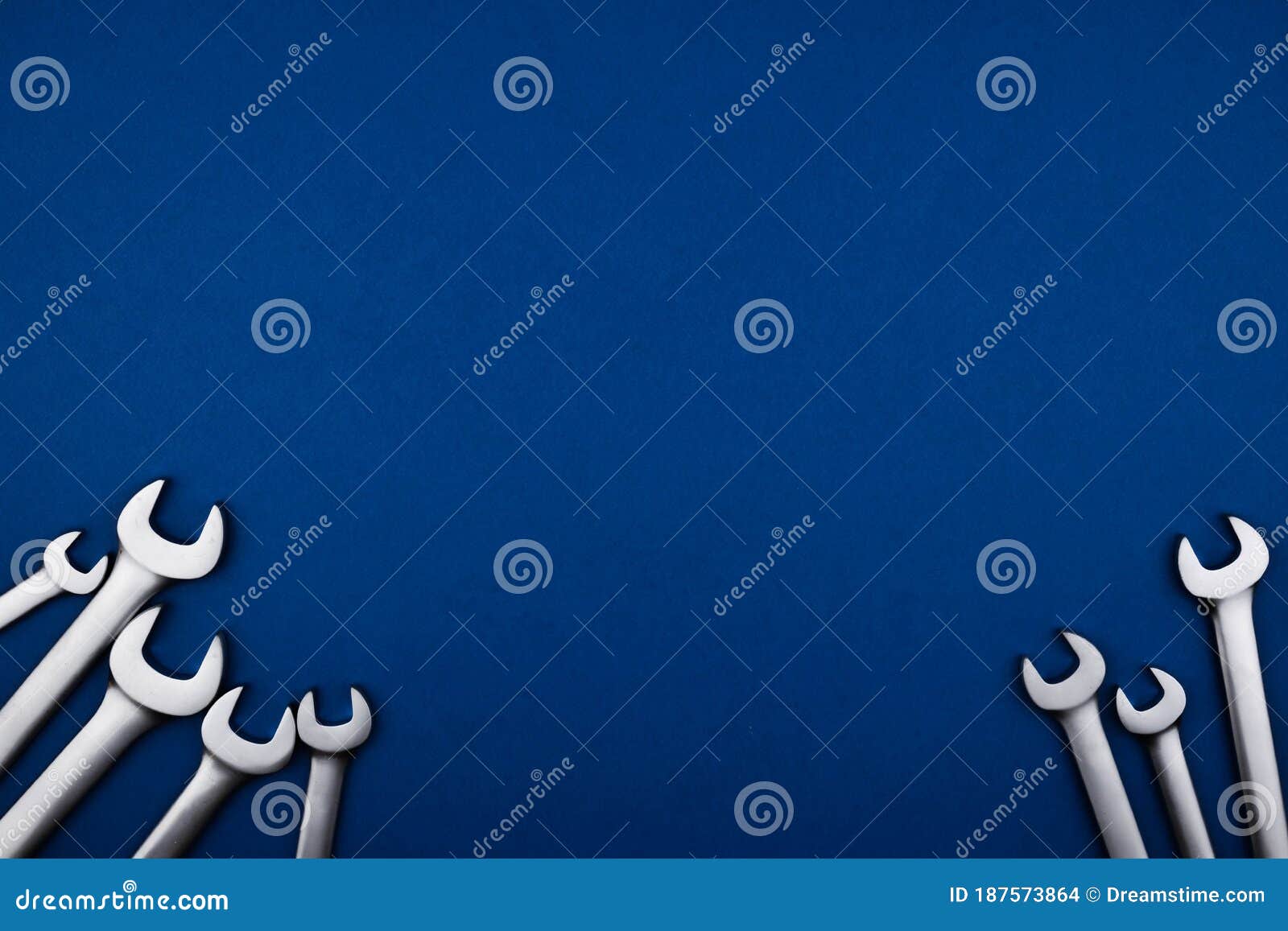 Set Chrome Spanner Keys Lying Side by Side on Blue Background. Flat Lay ...