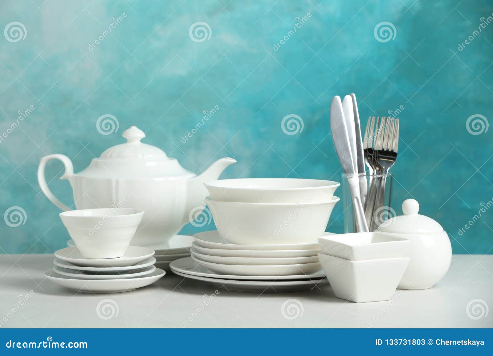 Set of Clean Dishes on Table Stock Image - Image of cups, drink: 133731803