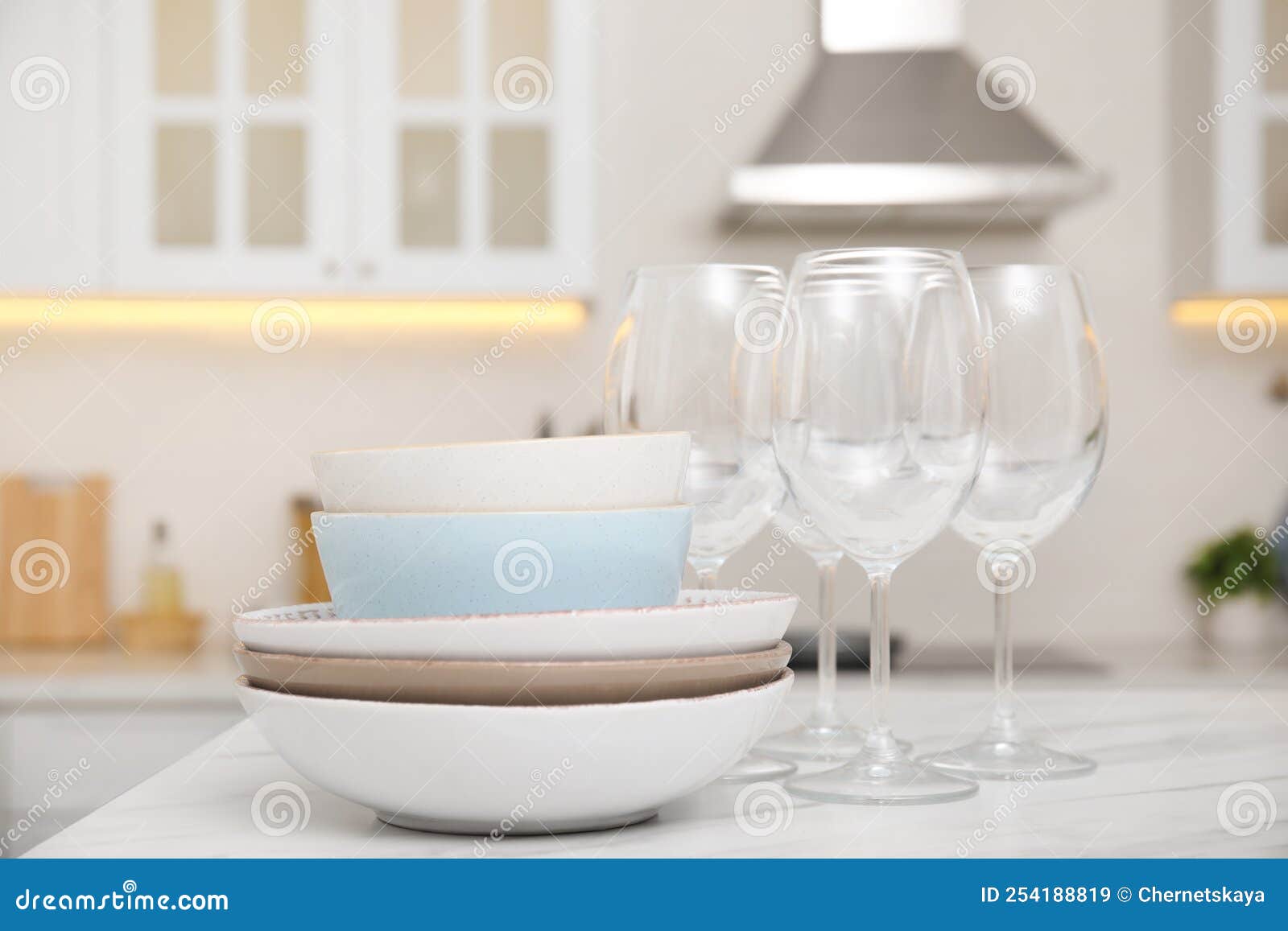 Set of Clean Dishes on Table in Stylish Kitchen Stock Image - Image of ...