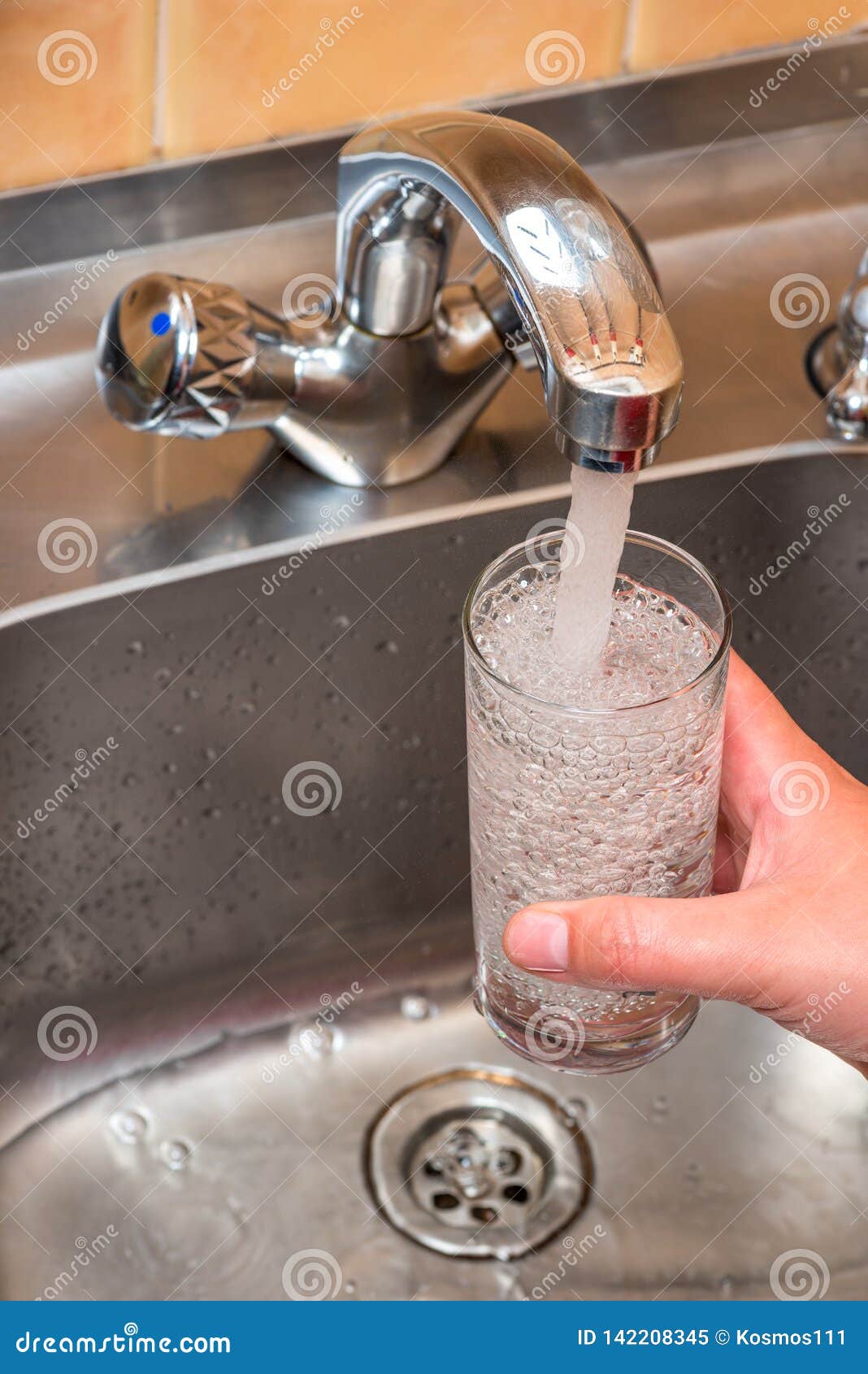 A Set of Clean Drinking Water from a Kitchen Tap into a Glass, Hand ...