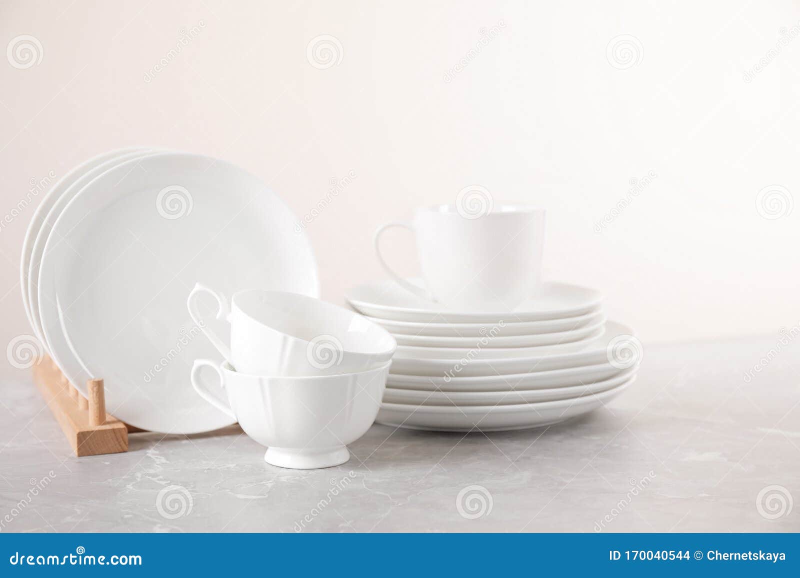 Set of Clean Tableware on Grey Marble Table Stock Photo - Image of ...