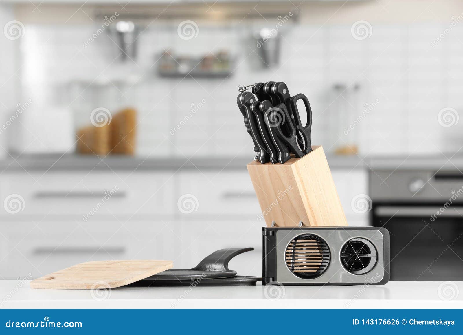 Set of Clean Utensils on Table in Kitchen Stock Photo - Image of dinner ...