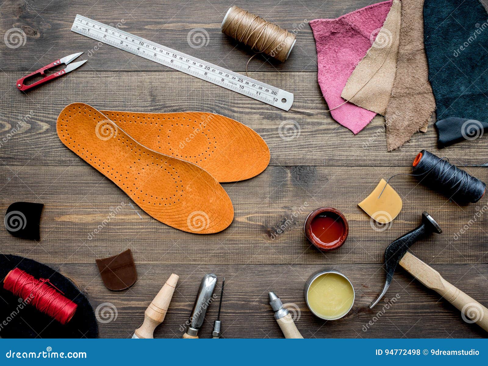 Set of Cobbler Tools on Brown Wooden Desk Background Top View Stock ...