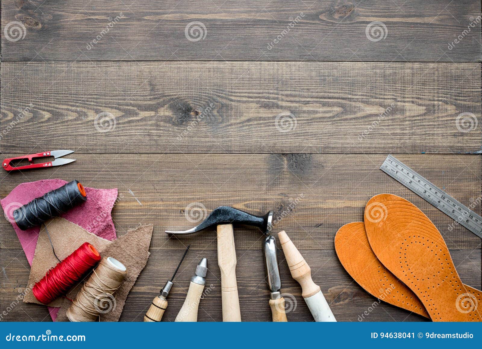 Set of Cobbler Tools on Brown Wooden Desk Background Top View Copyspace ...