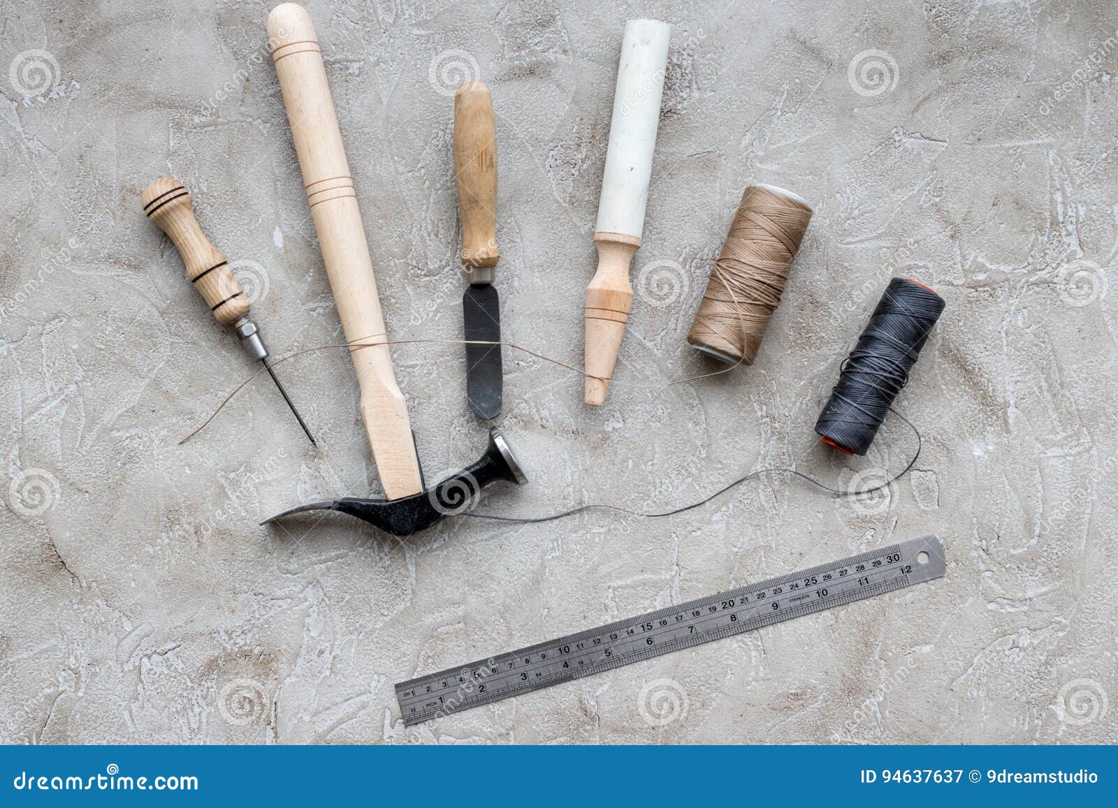 Set of Cobbler Tools on Grey Stone Desk Background Top View Stock Image ...
