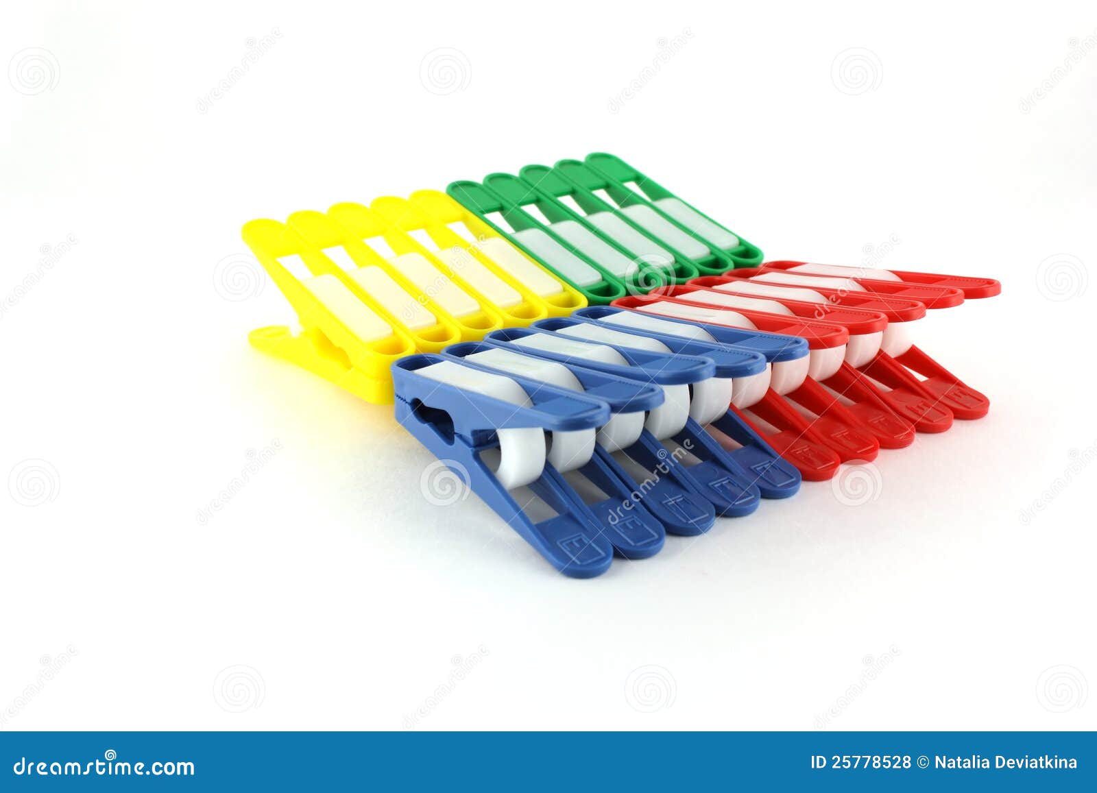 Set of color clothes-pegs stock photo. Image of yellow - 25778528