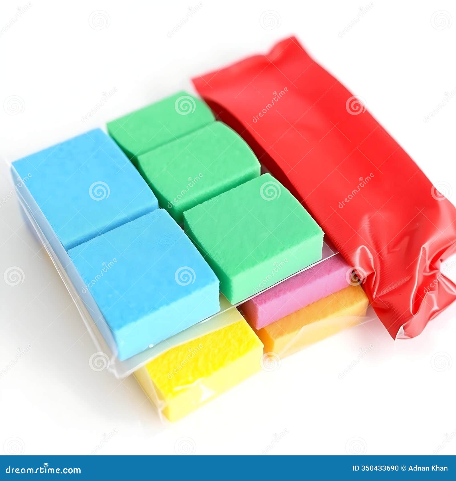 A Set of Color Coded Surgical Sponges in Sterile Packaging on a Plain ...