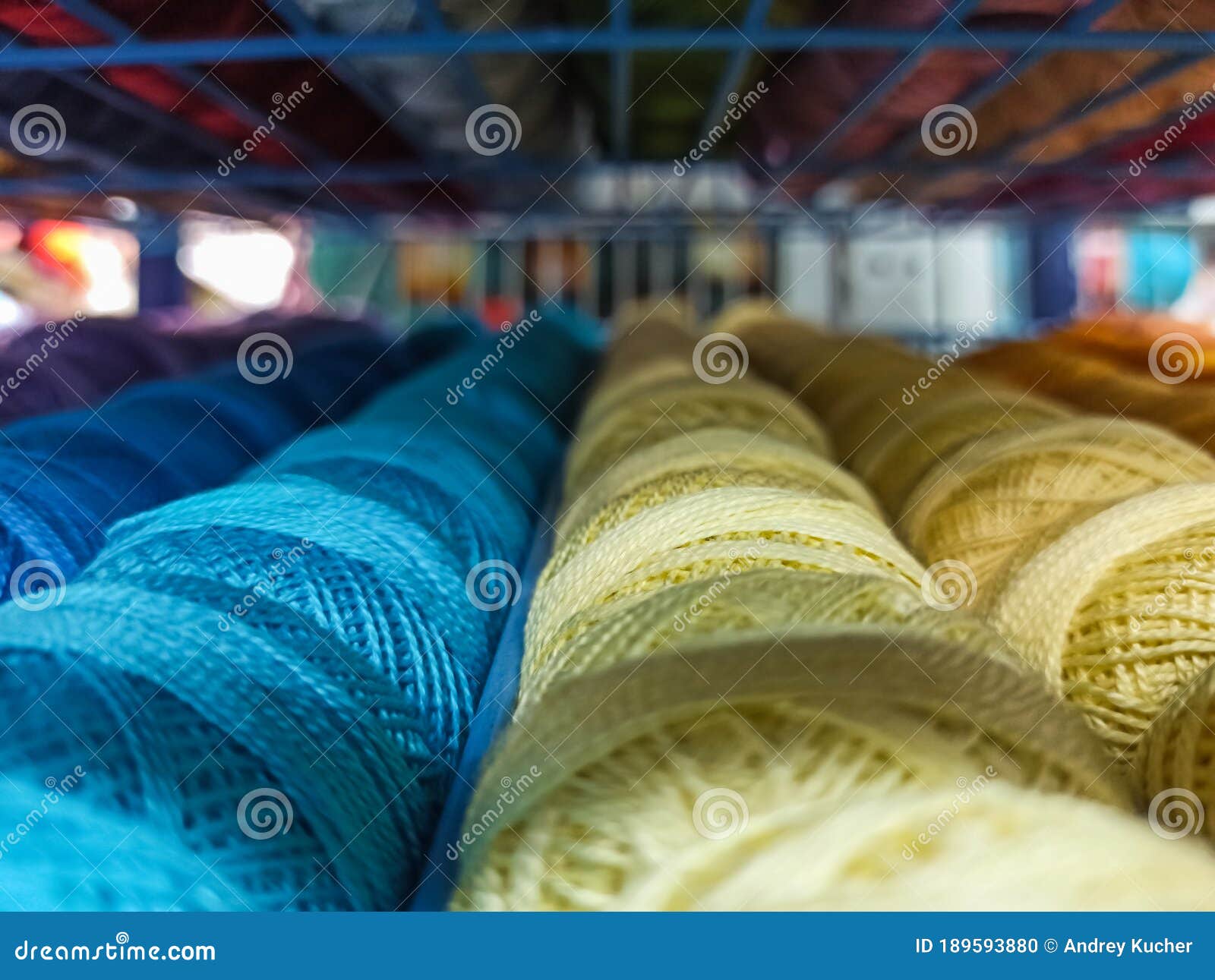 Set of Colored Threads for Sewing on Coils. Pile of Big Colorful Spools ...