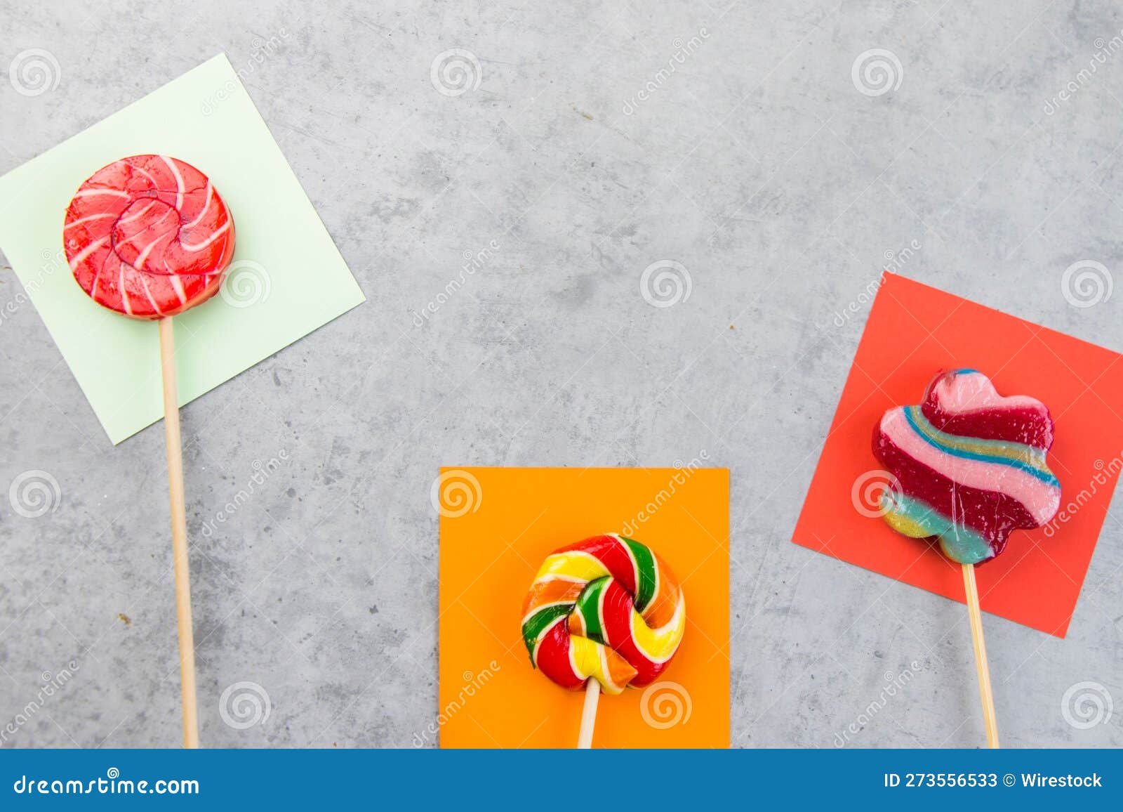 Set of Colorful Lollipops Placed Atop a Stack of Sticky Notes Stock ... Set of Colorful Lollipops Placed Atop a Stack of Sticky Notes Stock ...