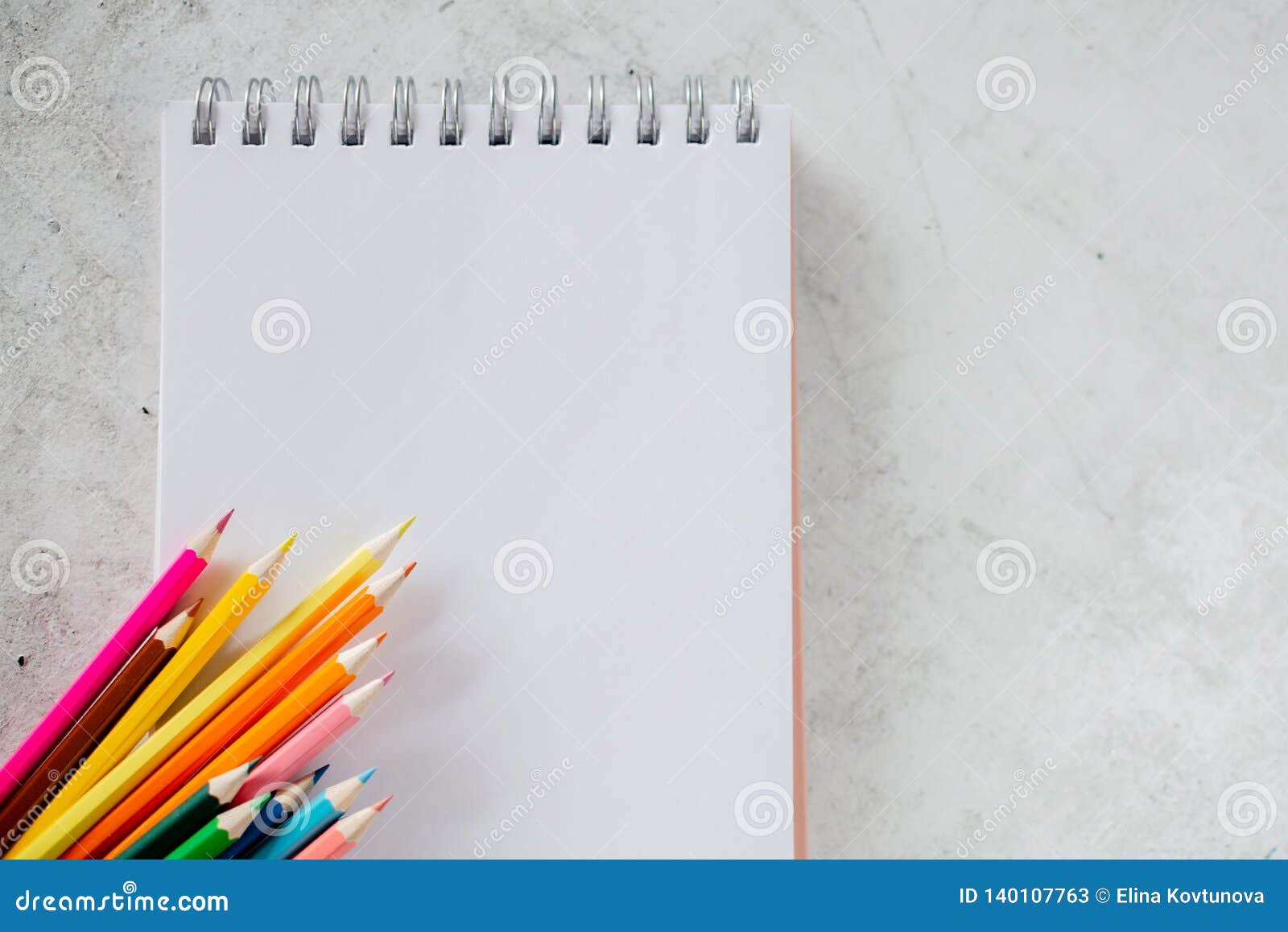 Set of Colorful Pencils on Abstract Spiral Notepad with White Sheets ...