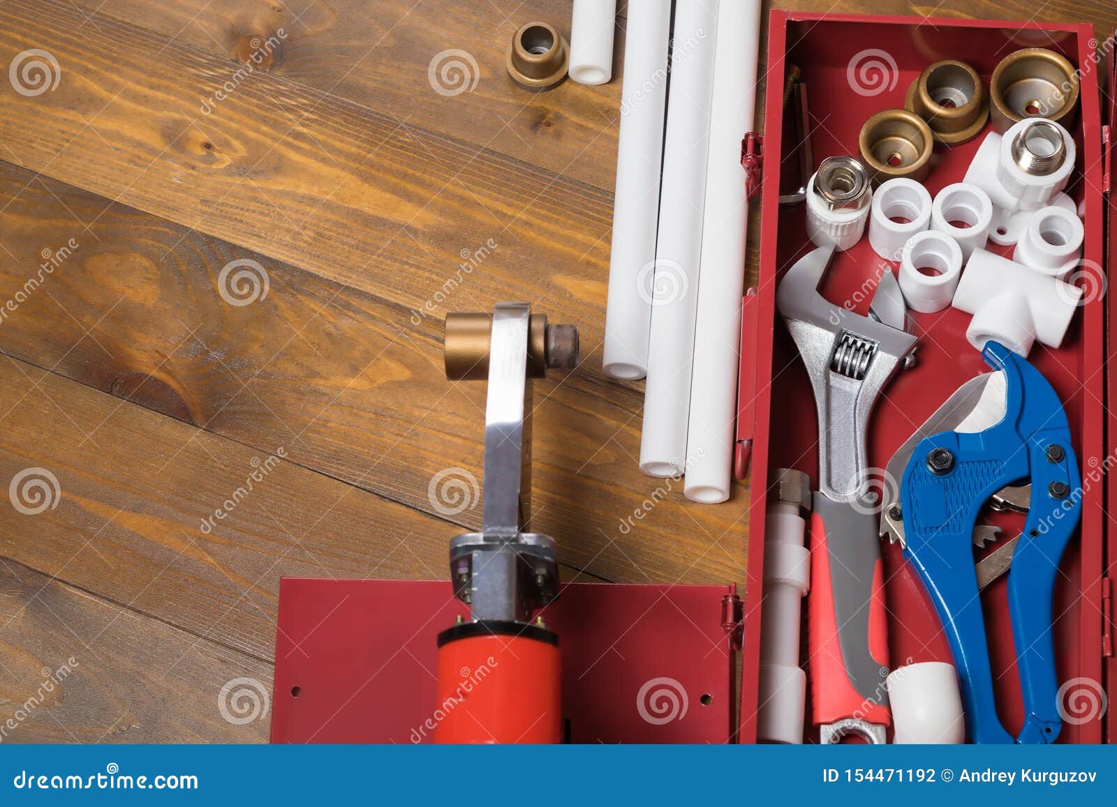 Set for Connecting and Cutting Plastic Pipes for Water Pipe on a Wooden ...