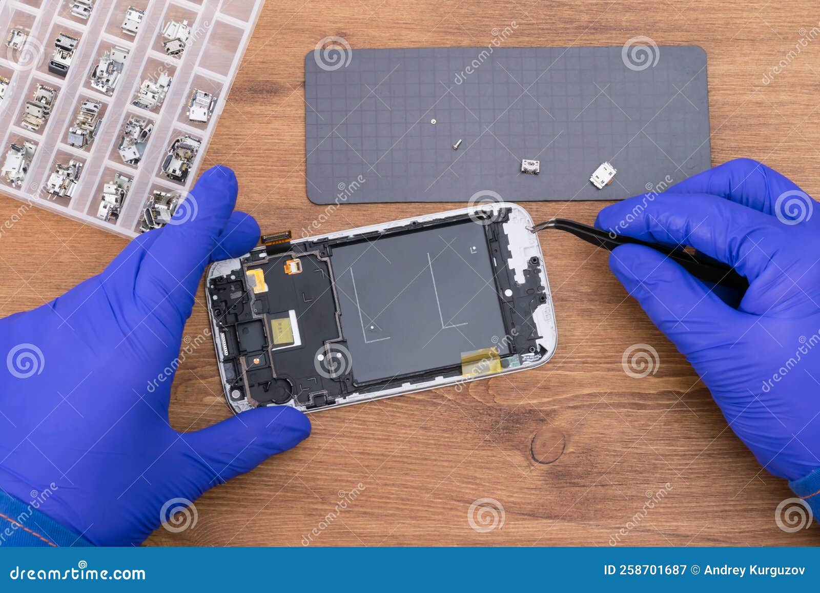 A Set of Contacts for Charging and the Process of Replacing a Connector ...