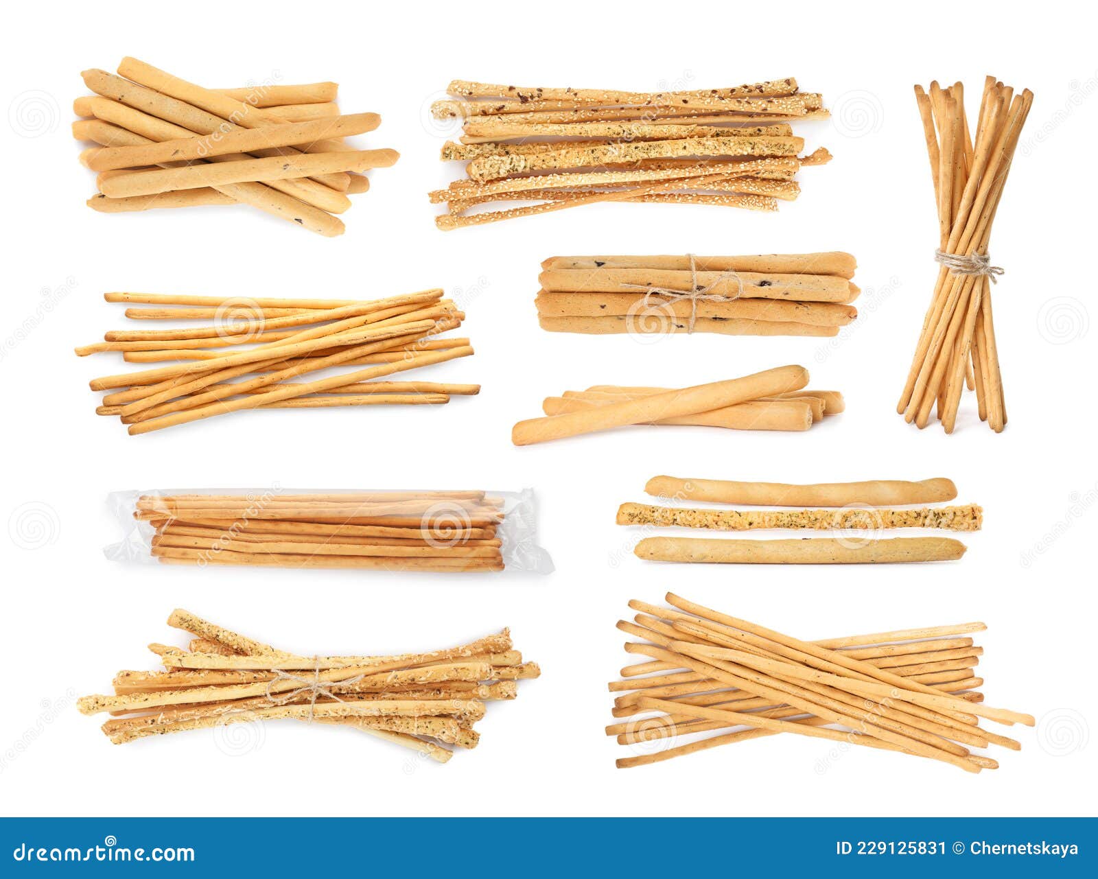 Set with Delicious Crispy Grissini Sticks on White Background Stock ...