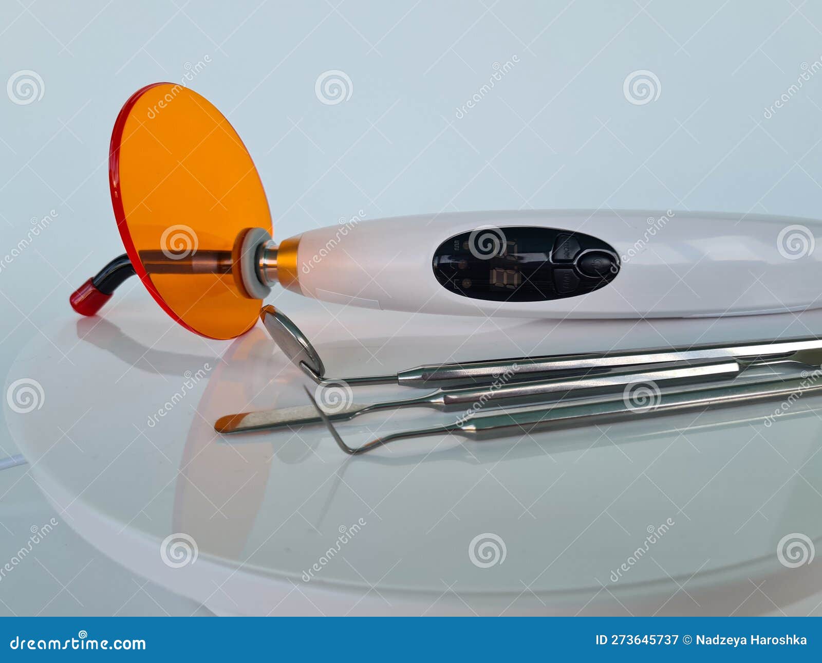Set of Dentures Dental Tools and Curing Light on Table Stock Image ...