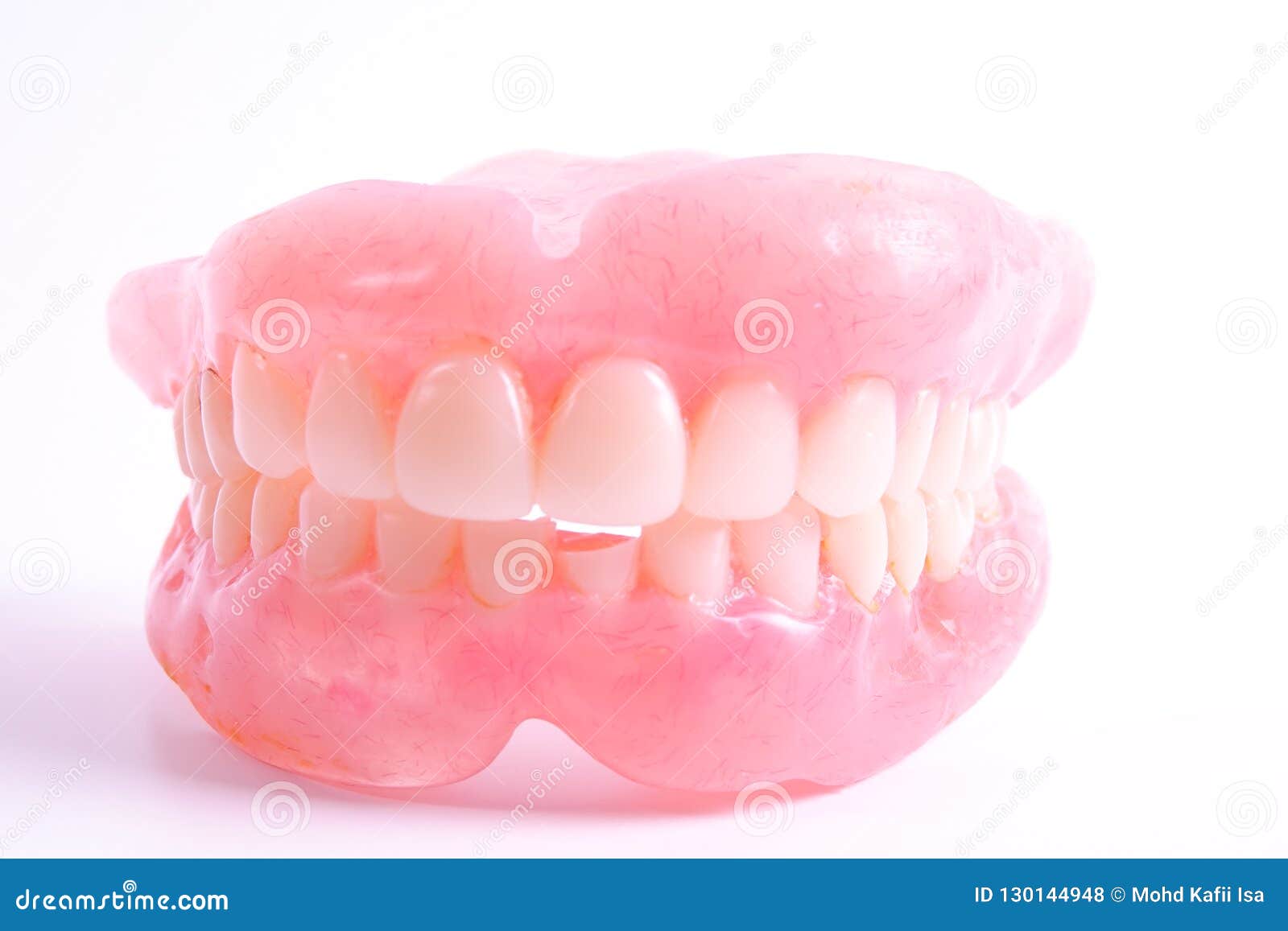A Set of Dentures Isolated on a White Background Stock Photo - Image of ...