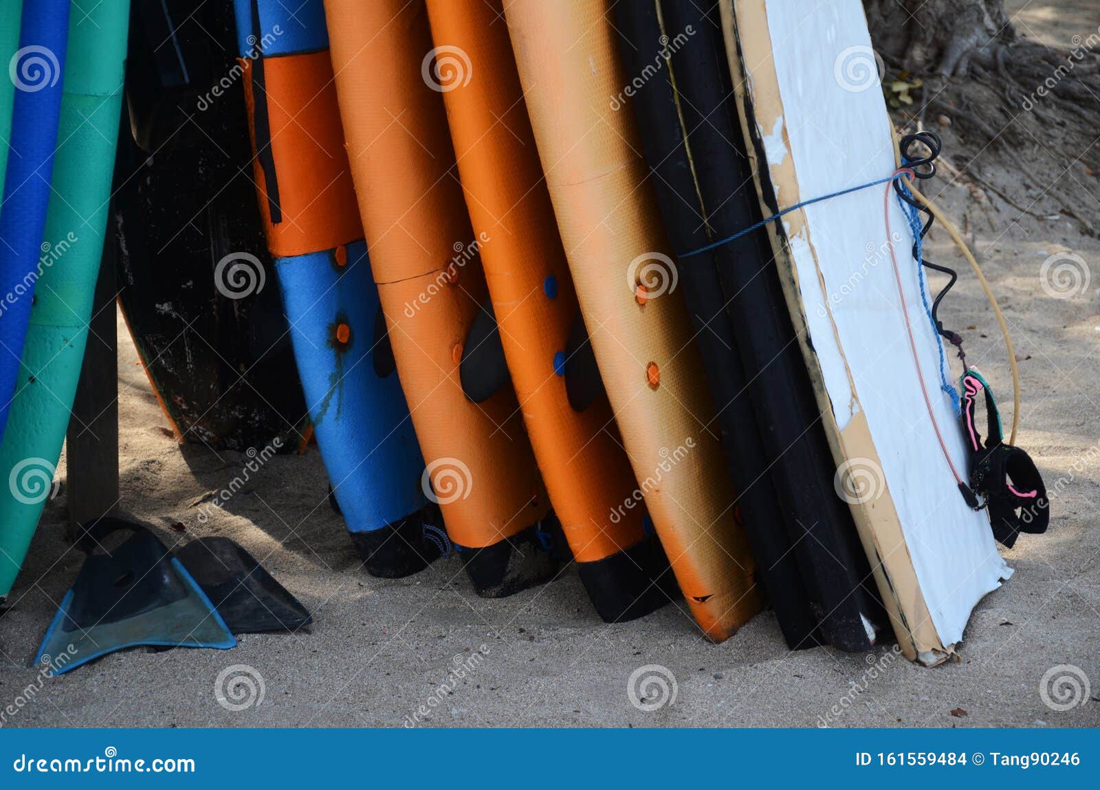Set of Different Color Surf Boards in a Stack by Ocean Stock Photo ...