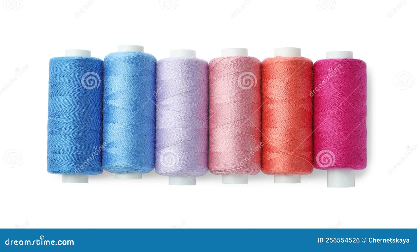 Set of Different Colorful Sewing Threads on White Background, Top View ...