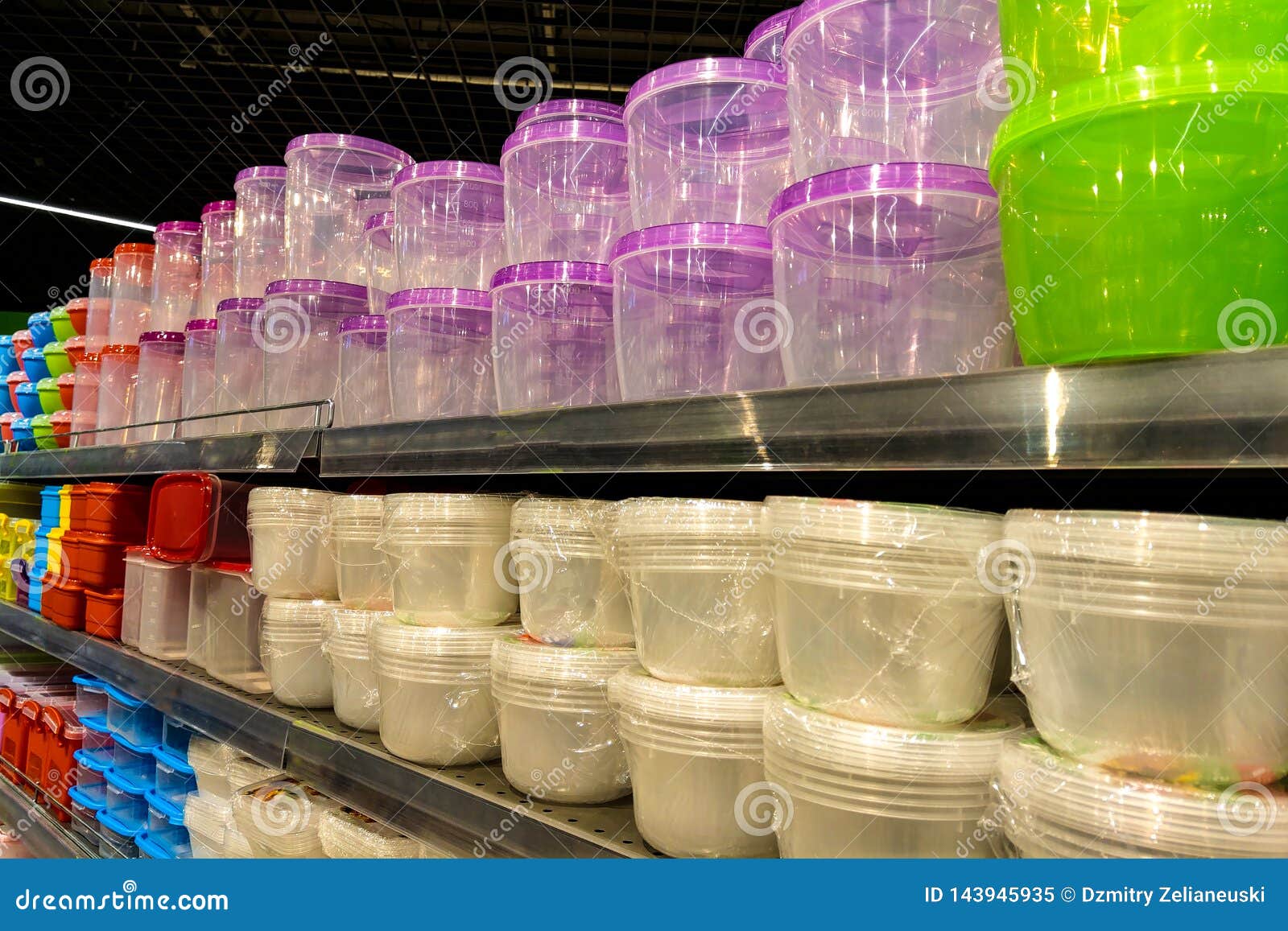 A Set of Different Colors and Sizes of Containers in the Store Stock ...