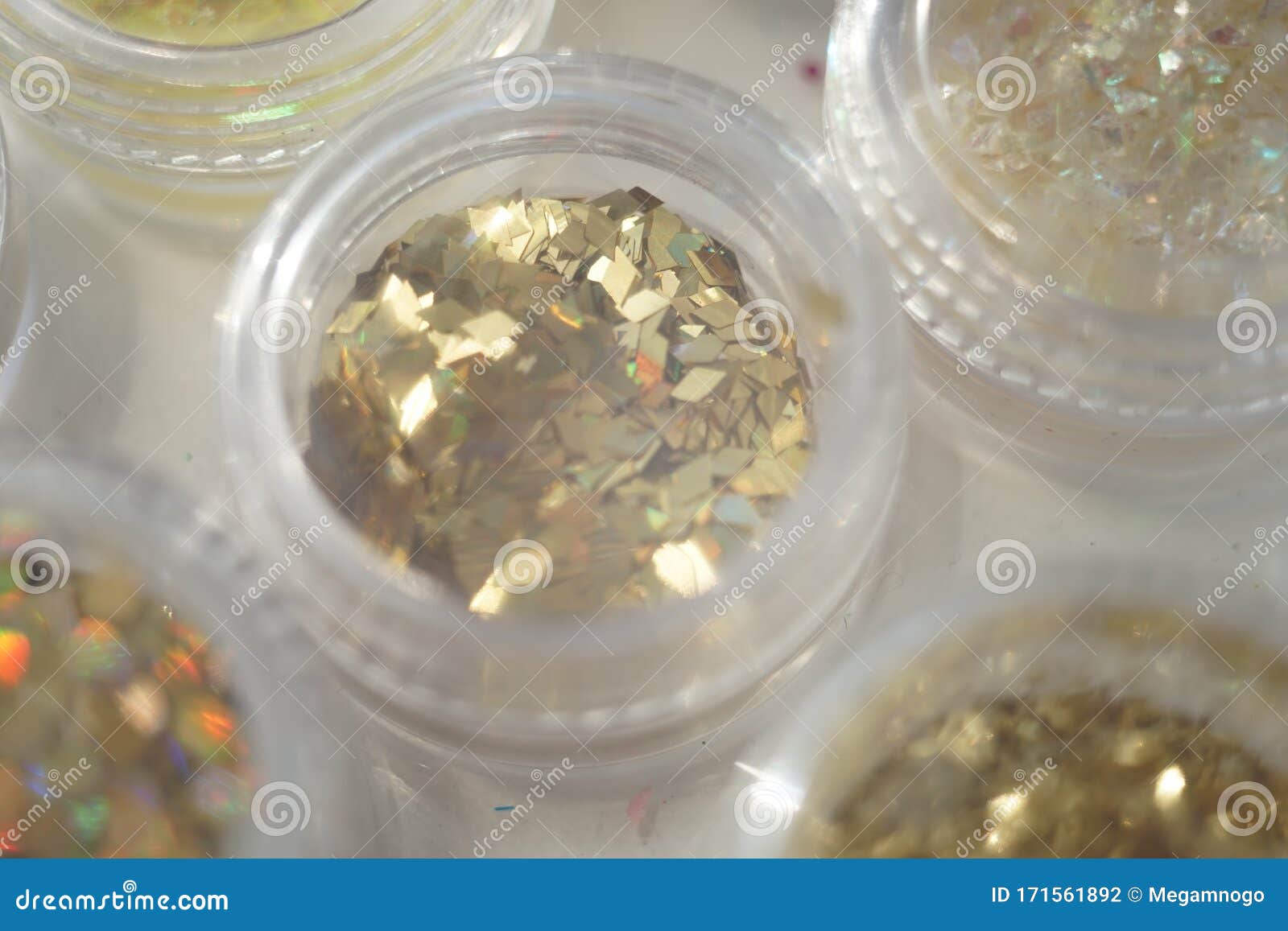 Set of Different Golden Spangles in Plastic Packaging Stock Photo ...