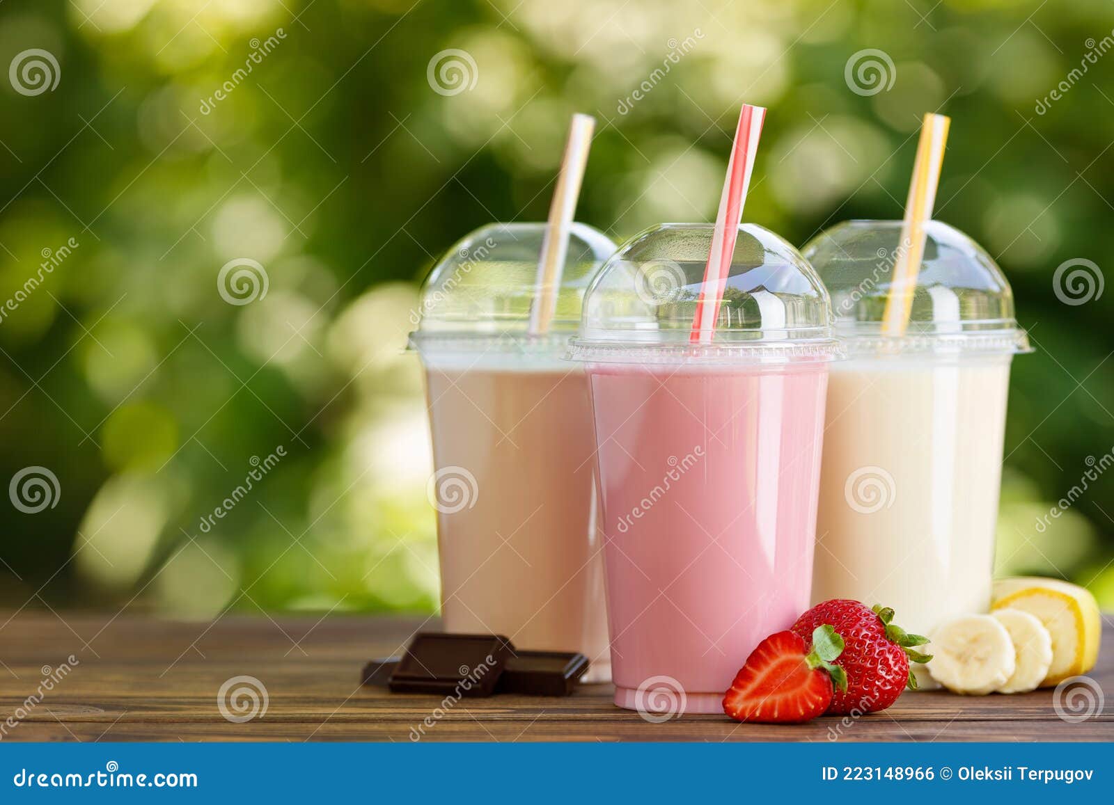 Set of Different Milkshakes in Disposable Plastic Glasses Stock Photo ...