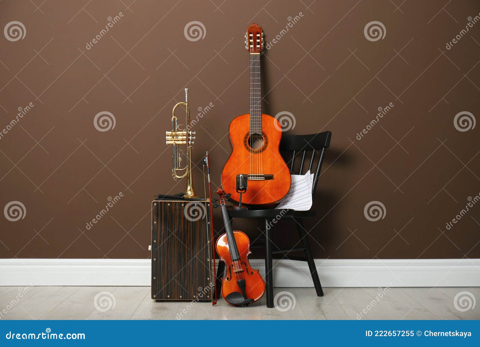 Set of Different Musical Instruments Near Brown Wall Indoors Stock ...
