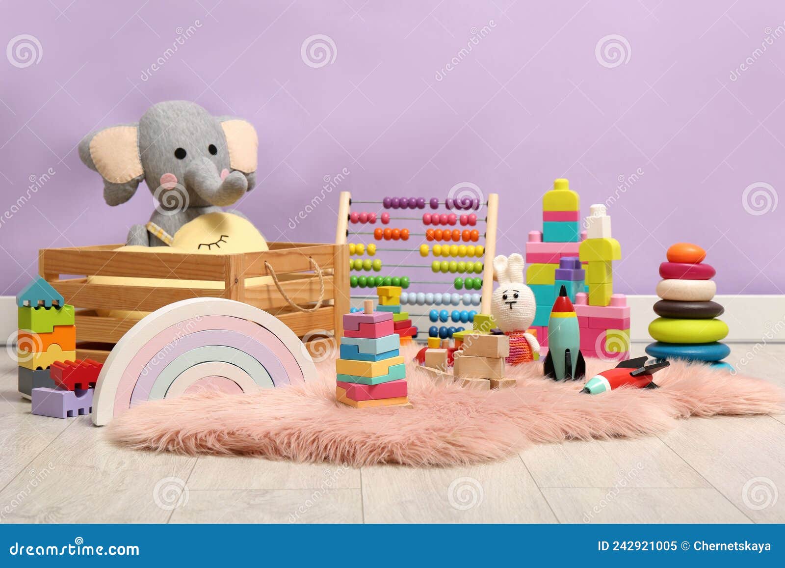 Set of Different Toys on Rug Near Wall Stock Image - Image of playing ...