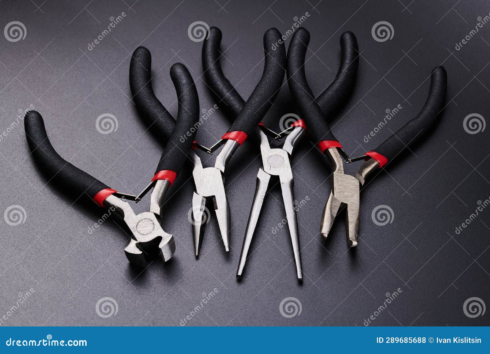 Set of Different Types of Pliers and Side Cutters Isolated on Black ...