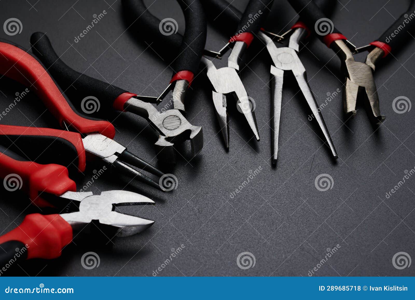 Set of Different Types of Pliers and Side Cutters Isolated on Black ...