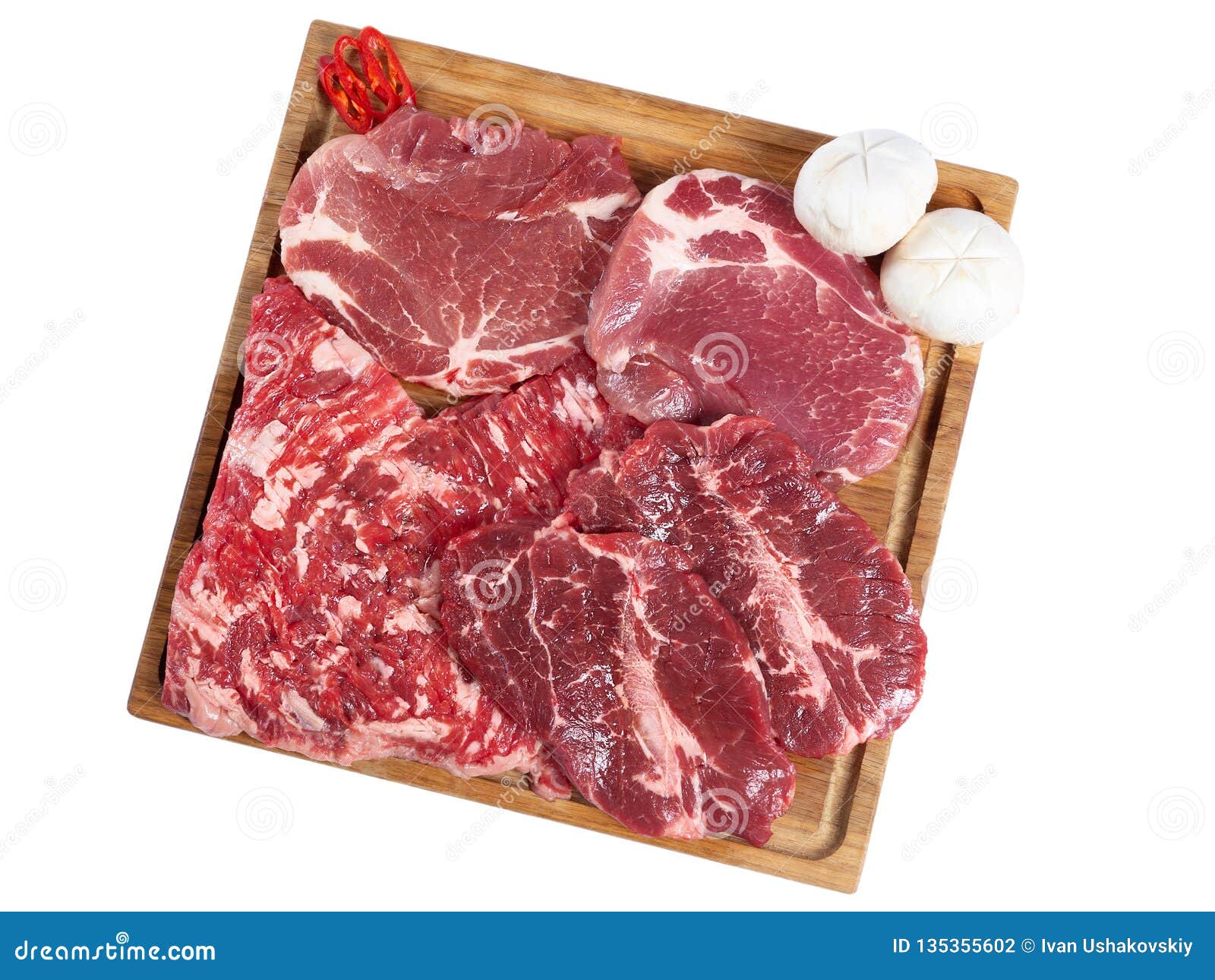 Set of Different Types of Raw Meat Steaks on Wooden Desk Isolated on ...
