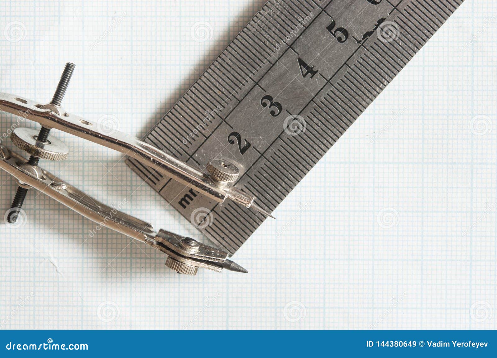 Set of Drawing Instrument and Rulers on Graph Paper Stock Image - Image ...