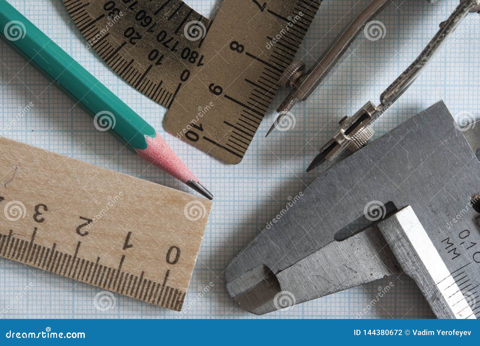 Set of Drawing Instrument and Rulers on Graph Paper Stock Photo - Image ...