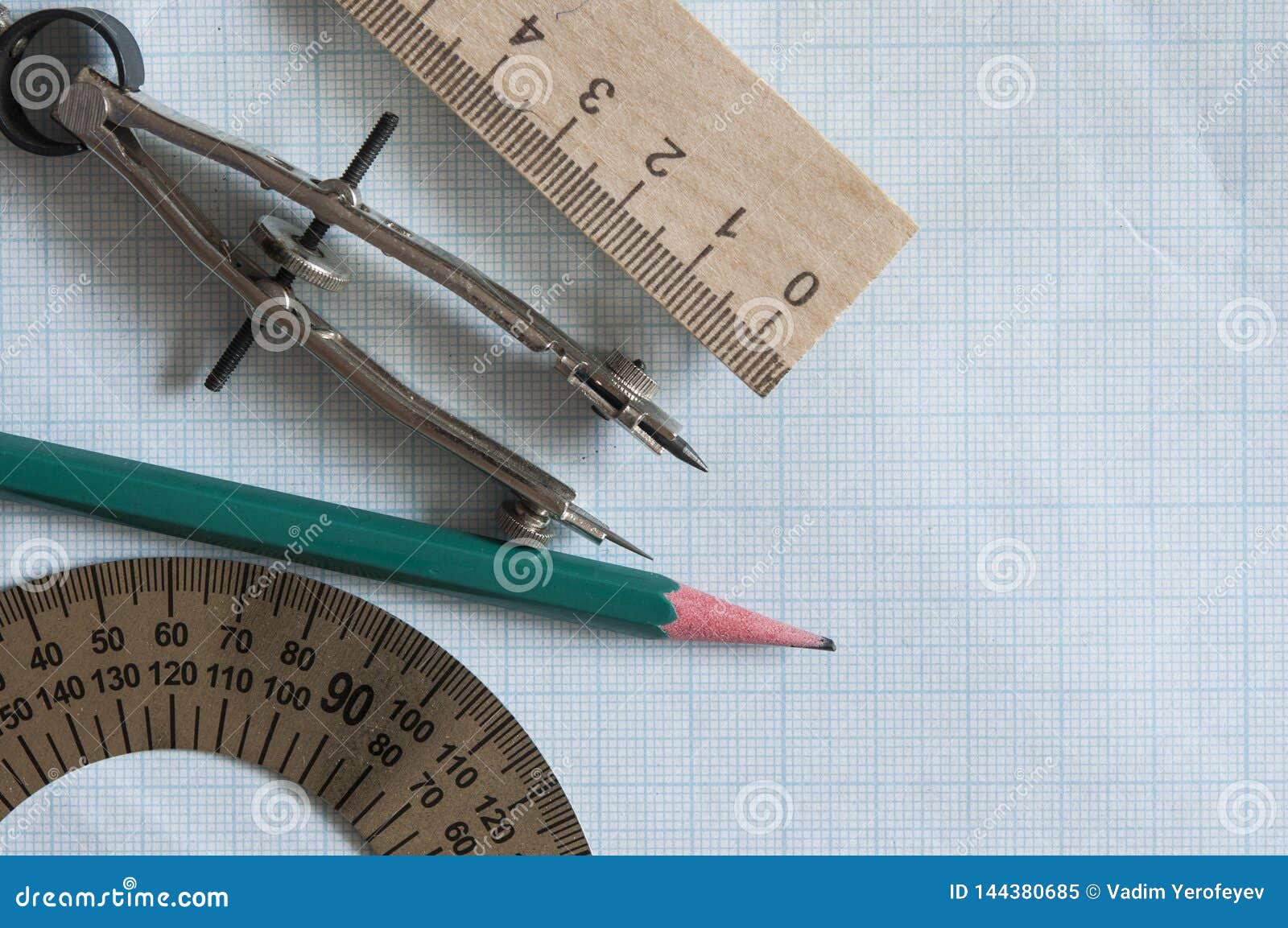 Set of Drawing Instrument and Rulers on Graph Paper Stock Image - Image ...