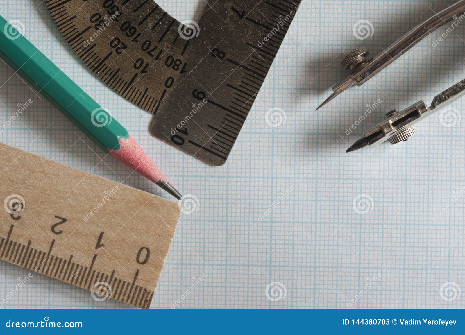 Set of Drawing Instrument and Rulers on Graph Paper Stock Image - Image ...